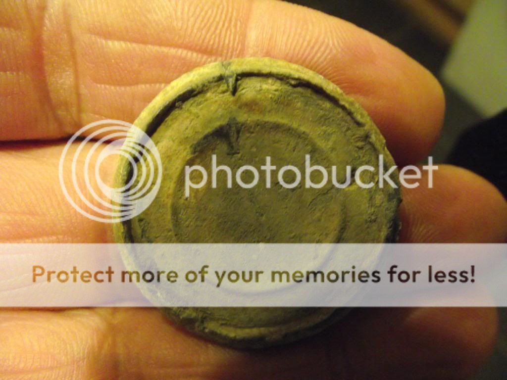 Decorated lead disc - Identification of Detecting Finds